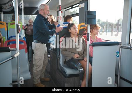 Woman with prosthetic leg commuting on bus Stock Photo - Alamy