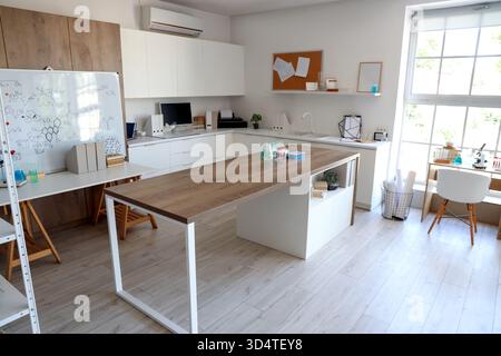 Interior of light medical laboratory with tables and houseplants Stock ...