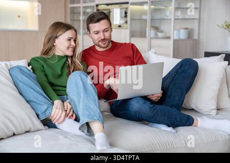 Cheerful friends having rest in park Stock Photo - Alamy