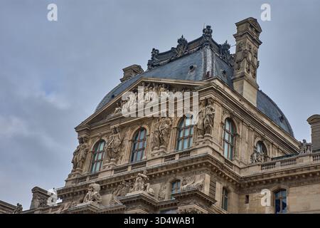 The facade of the Louvre Museum commands attention with its classical ...