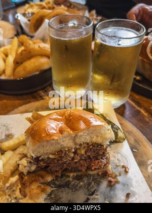 Juicy Burger With Crispy Fries and Refreshing Drink in Cozy Atmosphere ...