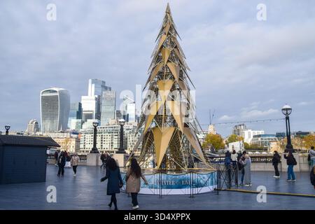 Borough Market at Christmas with the Shard skyscraper lit up beyond, in ...