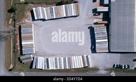 Enclosed Trailers parked neatly in a manufacturing area from top down ...