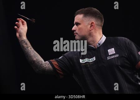 Ricky Evans during the second round match between James Wade and Ricky ...
