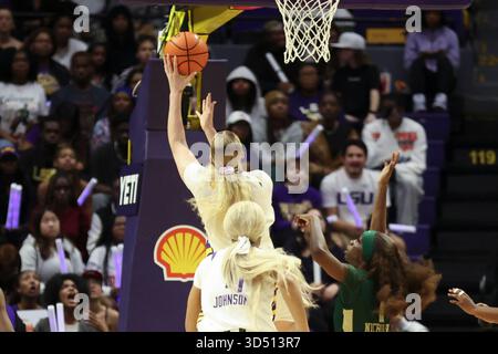 LSU Tigers forward Kate Koval (13) blocks Tulane Green Wave guard Jayda ...