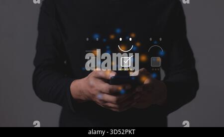 Customer Review, Young Man hand holding Smart Phone with five star to ...