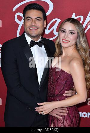 Carlos Rivera (L) and Cynthia Rodriguez attend the Latin Grammy Awards ...