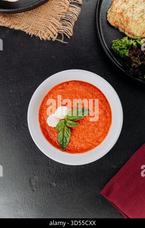 Mediterranean Tomato soup with basil and spices Stock Photo - Alamy