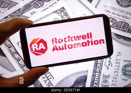 In this photo illustration, the Rockwell Automation logo is seen in the ...