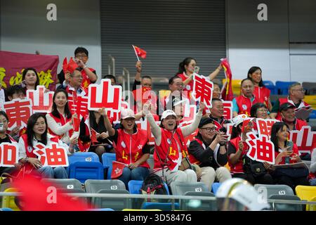 Spectators cheer for China's national team during the men's second ...