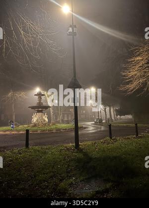 Small square with street lamps at night Stock Photo - Alamy