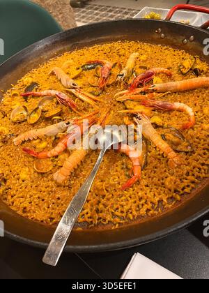Seafood Paella, famous Spanish rice dish in traditional frying pan ...
