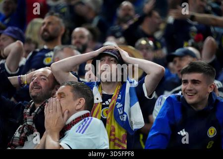 Scotland fans react in the stands during the FIFA World Cup Group C ...