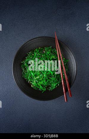 Chuka salad, made from fresh seaweed, with sesame dressing, served in a ...