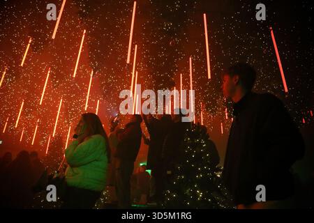 Visitors experience ice floating on the frozen river at Shenshuiwan ...