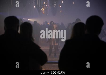 Visitors experience ice floating on the frozen river at Shenshuiwan ...