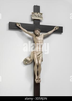 This crucifix depicts the figure of Christ on the cross, symbolizing ...