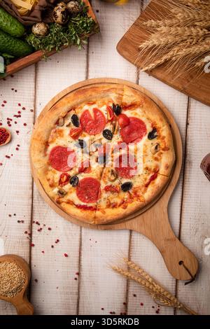 Delicious pepperoni pizza with mushrooms Stock Photo - Alamy