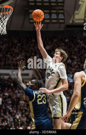 Purdue center Daniel Jacobsen (12) rebounds the ball against Wisconsin ...