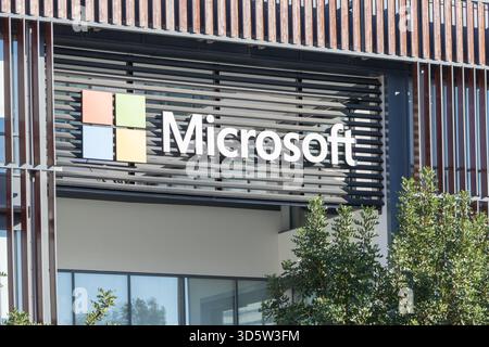 Microsoft logo displayed prominently on the exterior wall of its office ...