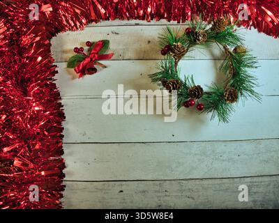 Artificial wreath on wood background Stock Photo - Alamy