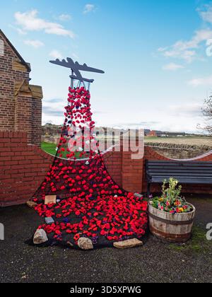 Lancaster bomber and crocheted poppy display for Remembrance Sunday 09 ...