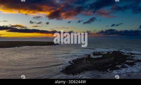 Aerial view of St Cwyfan’s Church on its tidal island Stock Photo - Alamy