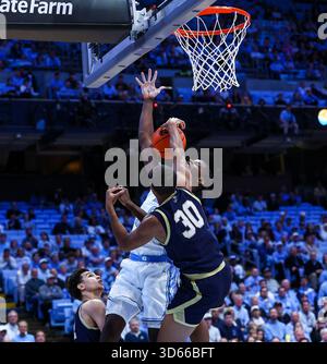 North Carolina forward Caleb Wilson (8) drives past USC Upstate forward ...
