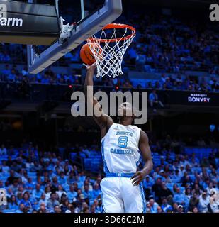 North Carolina forward Caleb Wilson, left, dunks over Michigan State ...
