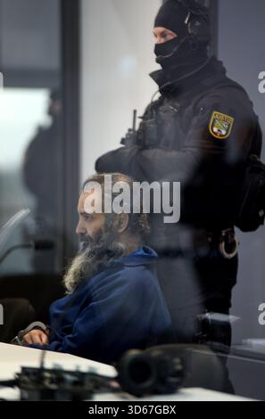 Taleb al-Abdulmohsen sits in a glass box during the trial at the ...