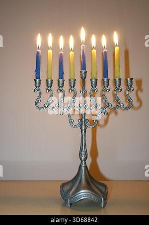Jewish holiday symbol Hanukkah Menorah brightly glowing soft focus ...