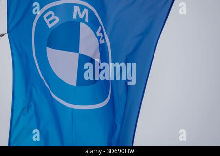Flag with BMW logo at a car dealership Stock Photo - Alamy