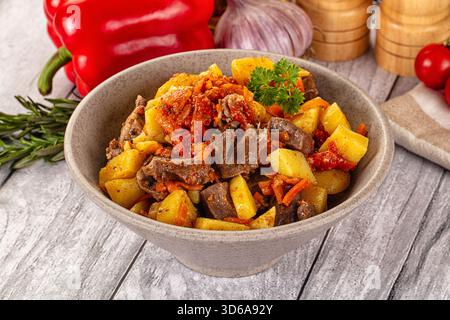 Homemade Rogiut with meat, potato and tomatoes Stock Photo - Alamy