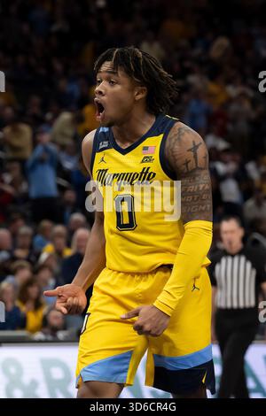 Marquette guard Nigel James Jr. (0) shoots the ball against Wisconsin ...