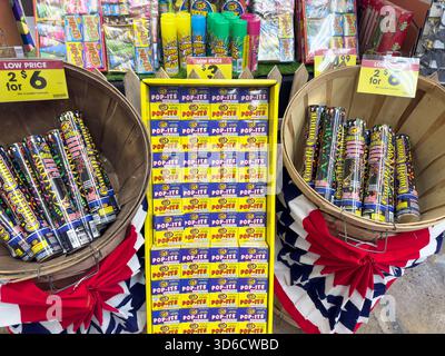Packages of fireworks stand on display in a Costco warehouse Tuesday ...