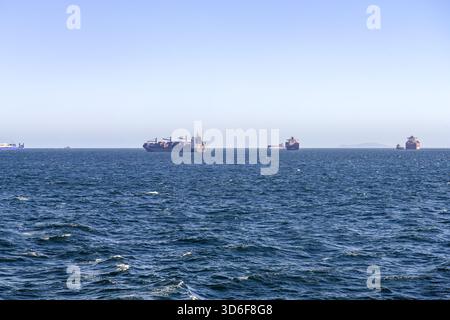 Oil tanker crossing the Strait of Gibraltar with other ships on the ...