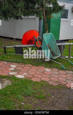 stack of garden wheelbarrows Stock Photo - Alamy