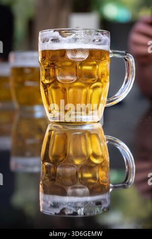 A cold crisp pint of beer on a clean background with copyspace Stock ...