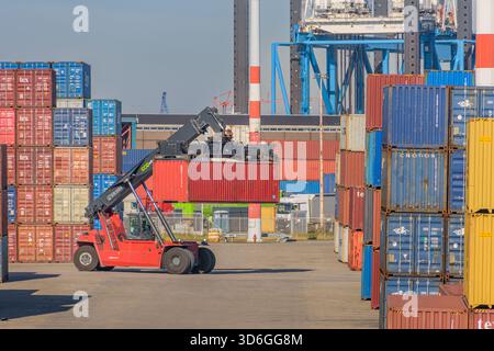 Process of loading containers by container loader at huge container ...