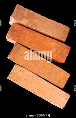 A closeup shot of a four holes on a steel plate Stock Photo - Alamy
