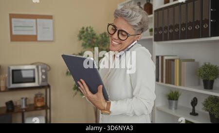 Woman holding agenda, structure in background, low angle view Stock ...