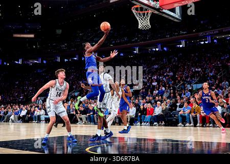 Kansas guard Melvin Council Jr. shoots during the first half of an NCAA college basketball game ...