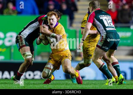 Northampton Saints' George Hendy is tackled by Exeter Chiefs' Olly ...