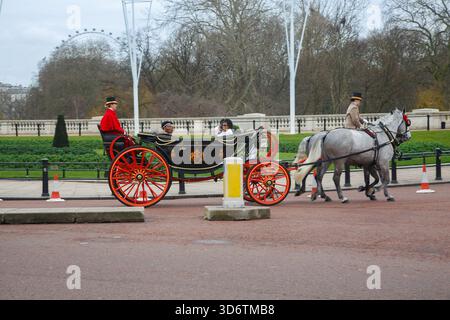 An Elegant chariot with black important african people leaving the ...