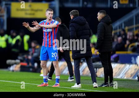 Crystal Palace's Adam Wharton (left) and Fulham's Sasa Lukic battle for ...