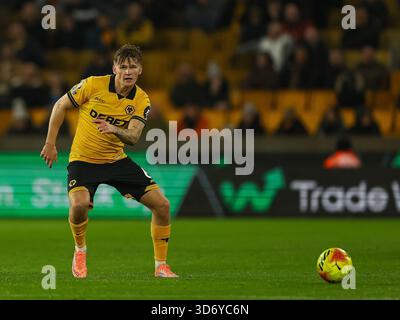 Wolverhampton Wanderers' David Moller Wolfe, right, challenges Arsenal ...