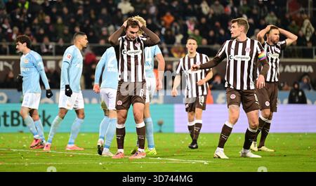 From left: Eric Smith, Karol Mets, Christian Eriksen (Wolfsburg ...