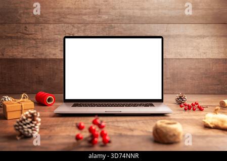 Festive red composition with white laptop computer, headphones, big cup ...