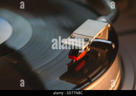 Turntable plays a vinyl record Stock Photo - Alamy