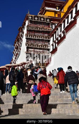 January 15th 2021 - Lhasa, Tibet: People climbing the stairs of the ...